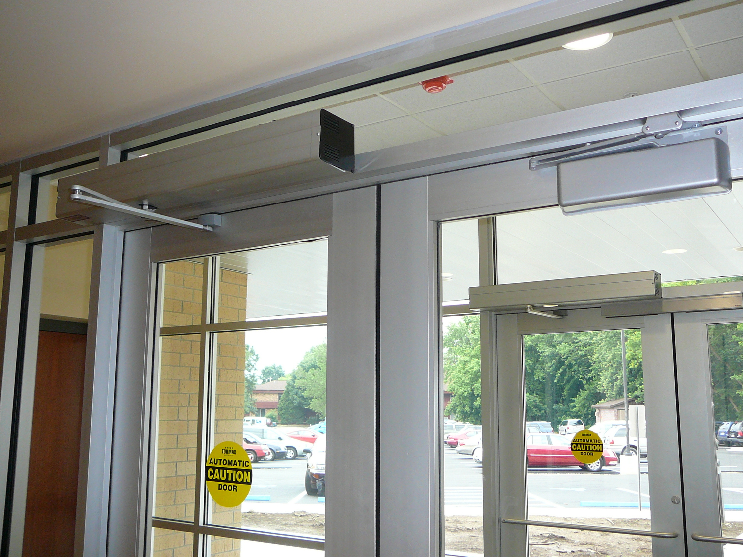 Commercial Automatic Door Openers | Canuck Door System